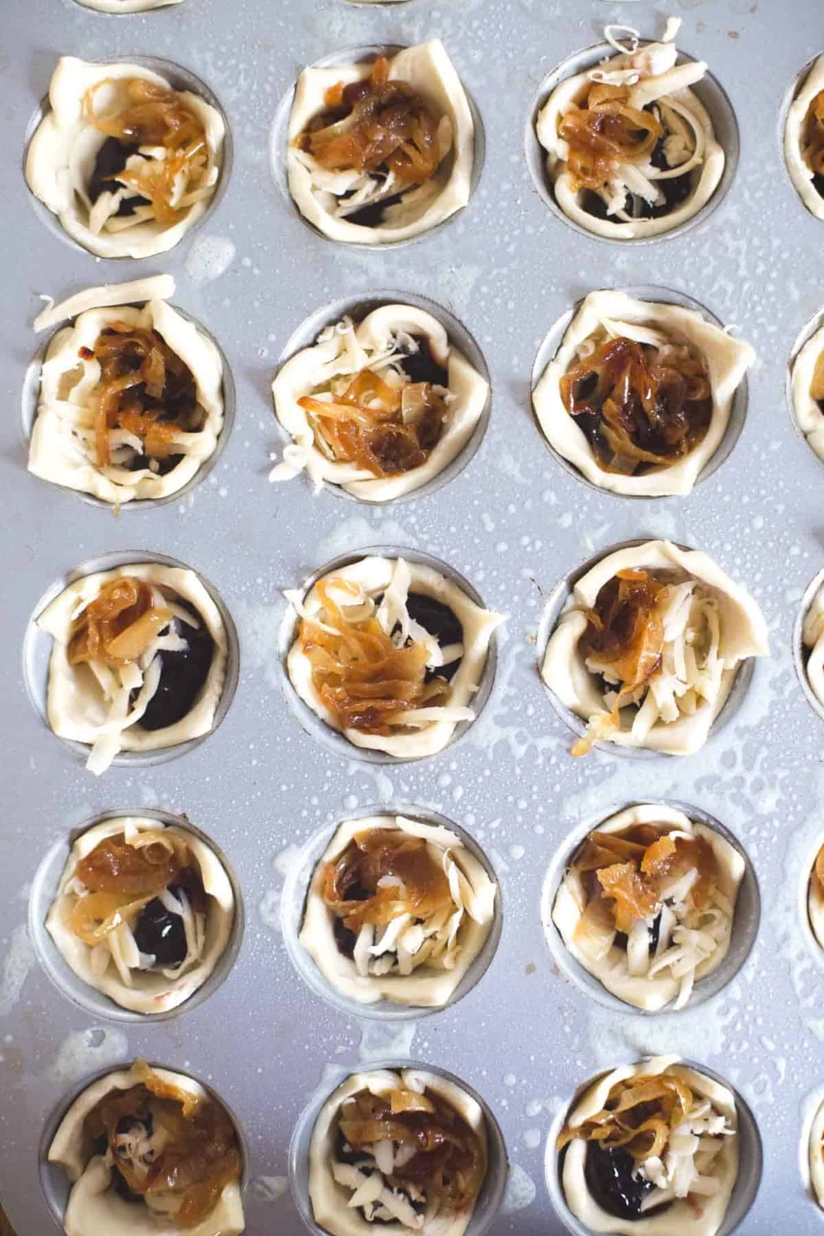 Savory Pastry Bites with Caramelized Onions and Gouda